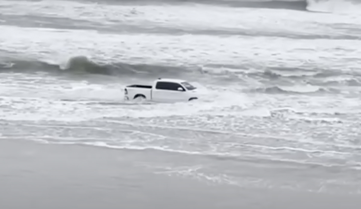 Florida Man Surfs Truck at New Smyrna Beach