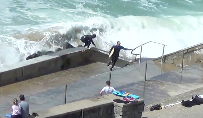 Wave Slams Surfer into Rocks in Biarritz | The Inertia