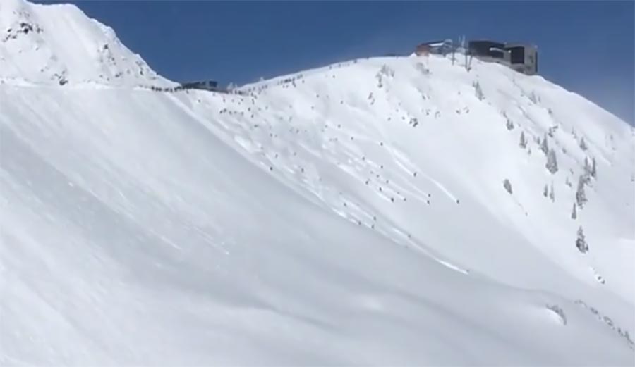 Skiers Charging Slope After Rope Drops on a Powder Day at Snowbird ...