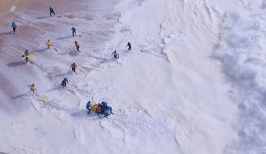 Watch the Amazing Rescue of Big Wave Surfer Alex Botelho at the Nazaré ...