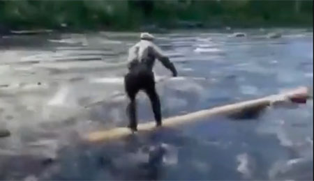 Watch This Grandpa Make Riding a Log Look Easy | The Inertia