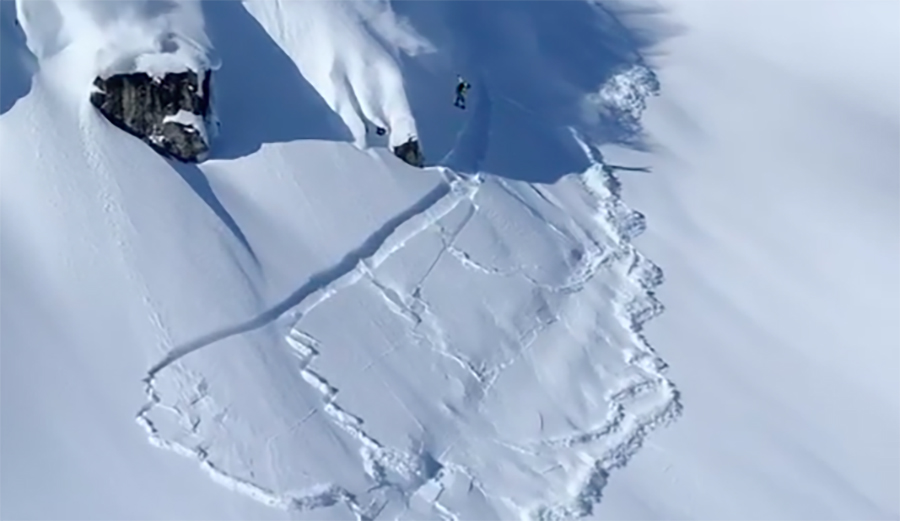 Watch Snowboarder Rusty Ockenden Send (and Stick) a Healthy Cliff While ...