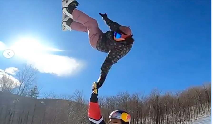 And Now, a Mid-Air Inverted High Five on a Snowboard | The Inertia