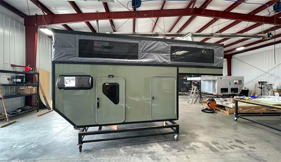 This Custom Truck Camper Has a Built-In Garage to Store All Your ...