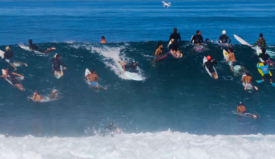 Jamie O'Brien and Lucas Chumbo Surf Very Crowded Pipeline