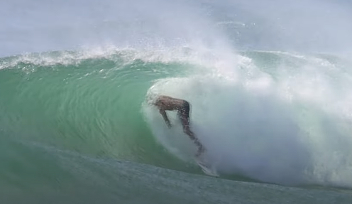 South Straddie Surfer Takes Board Straight to The Face