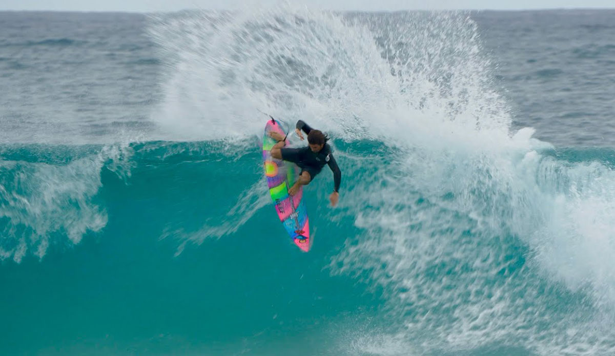 Mason and Michael Ho Trading Waves at Ehukai Beach Park