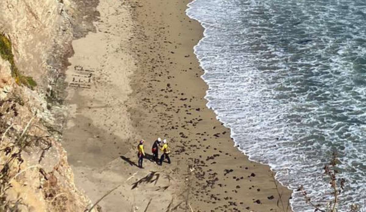 Stranded Kite Surfer Rescued After Writing 'Help' in Sand