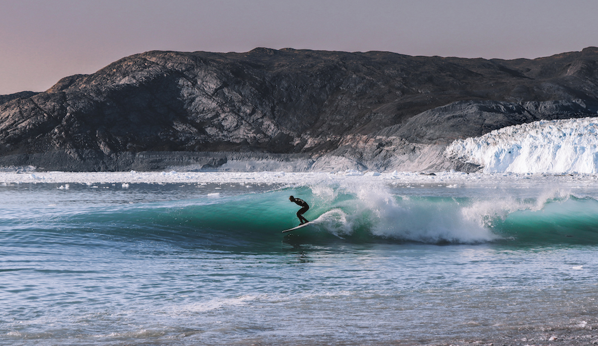 Surfer Rides Incredible Calving Glacier Wave in Greenland